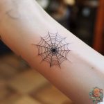 Untangling the Intriguing History and Meaning Behind Spider Web Tattoos ...