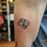 Unleashing the Power: Exploring the Symbolism of Boxing Gloves Tattoos ...