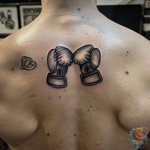 Unleashing the Power: Exploring the Symbolism of Boxing Gloves Tattoos ...