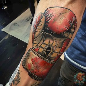 Unleashing the Power: Exploring the Symbolism of Boxing Gloves Tattoos ...