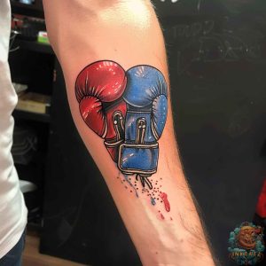 Unleashing the Power: Exploring the Symbolism of Boxing Gloves Tattoos ...