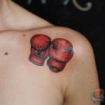 Unleashing the Power: Exploring the Symbolism of Boxing Gloves Tattoos ...